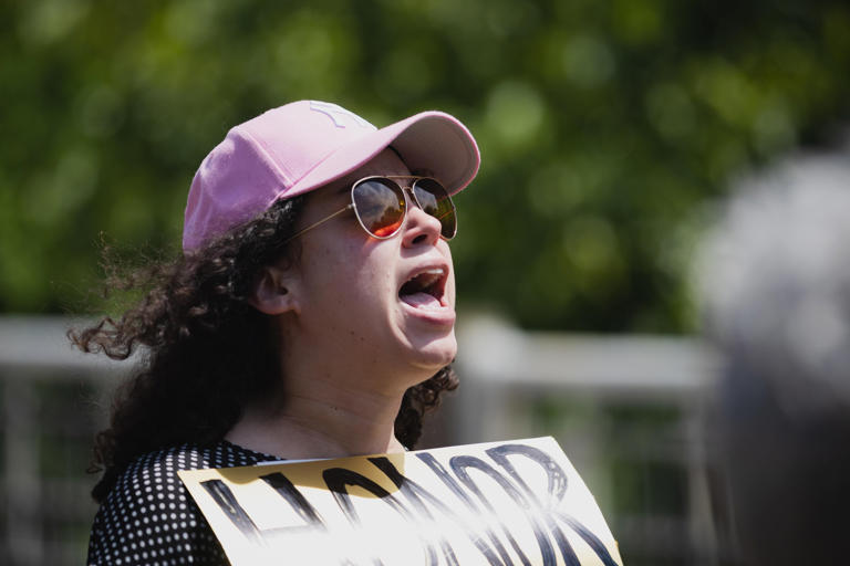 Voting rights activists take symbolic walk across famous bridge as ...