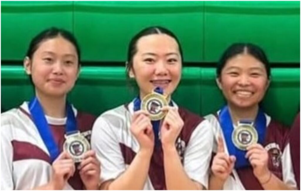St. Paul Johnson’s Amanda Her speaks after winning badminton state title
