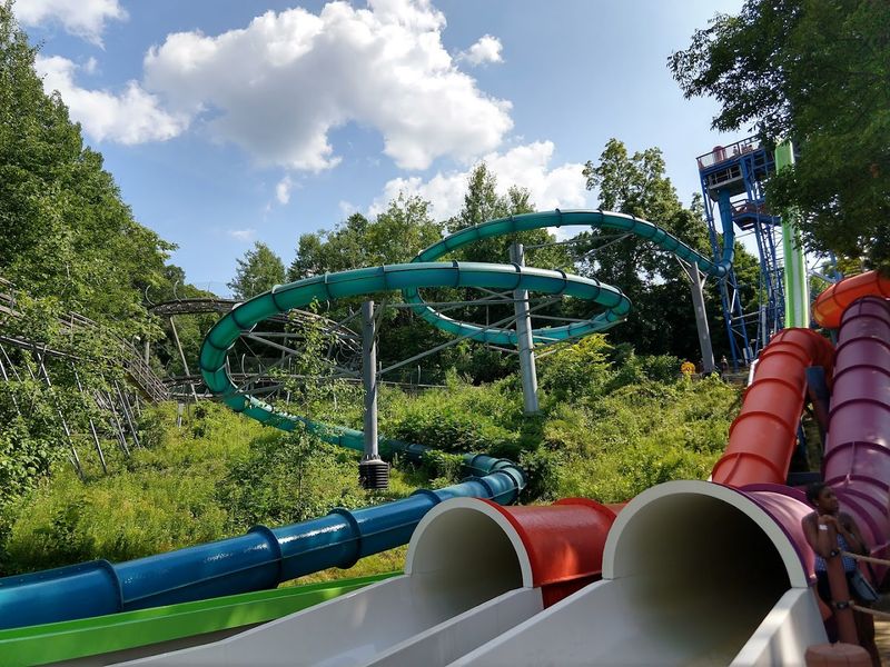 World’s tallest double-loop waterslide and mountaintop zip tour await ...