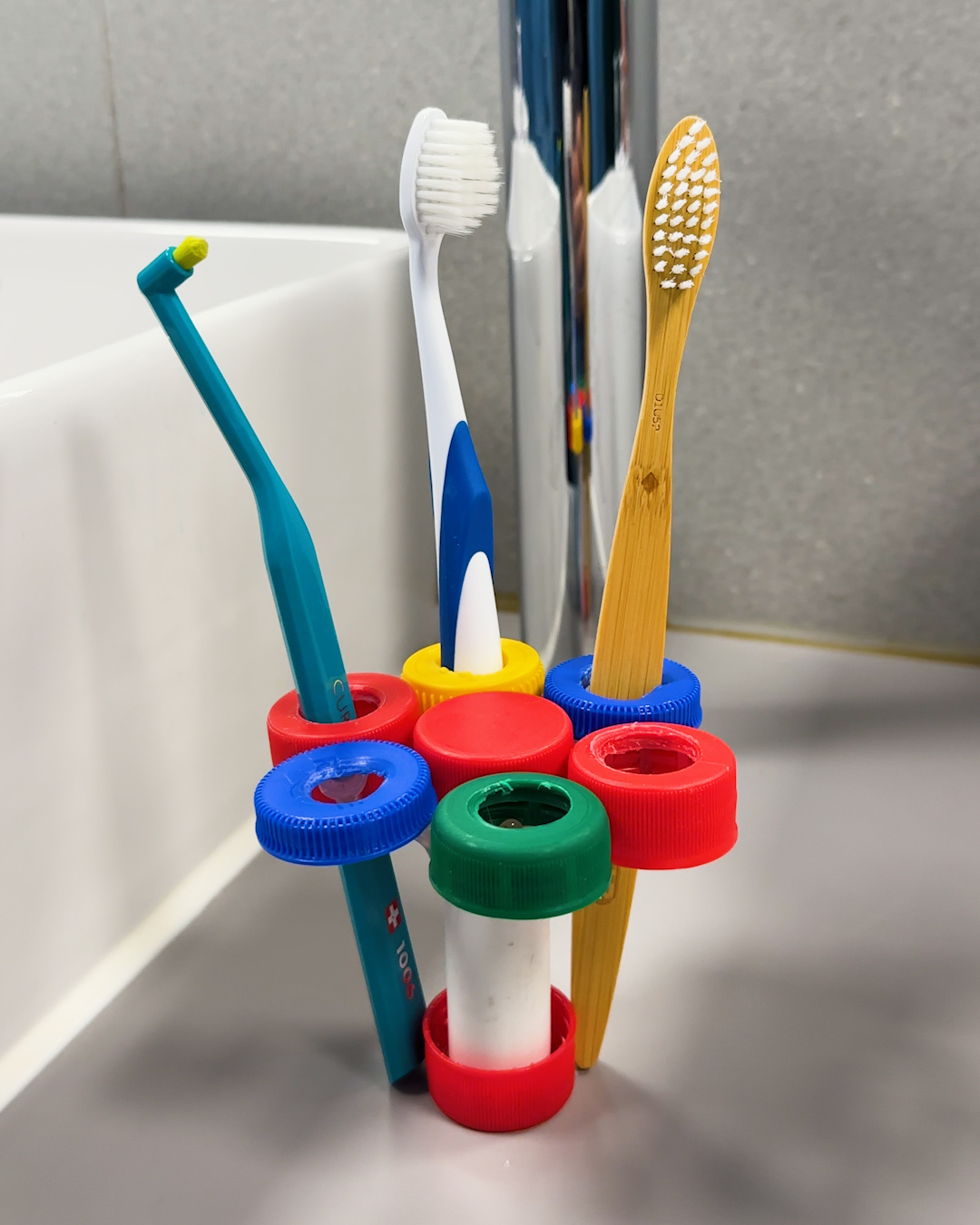 DIY toothbrush holder from bottle caps