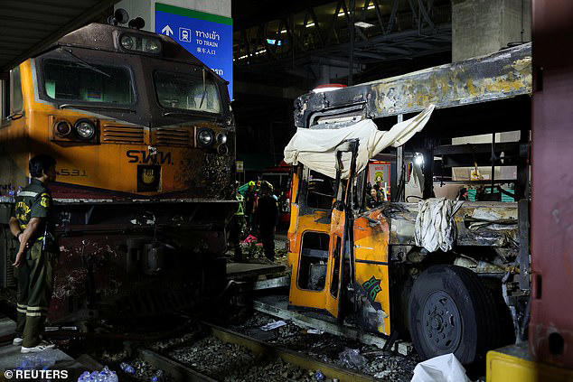 Freight train ploughs into bus at full speed in horrific Bangkok ...