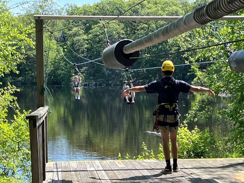 World’s tallest double-loop waterslide and mountaintop zip tour await ...