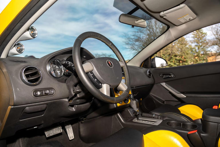 The strangest car in Roush’s garage isn’t a Mustang, it’s a Pontiac G6