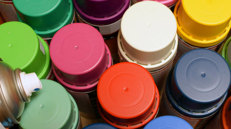 Reuse old spray paint can lids to DIY the cutest mini patio lanterns