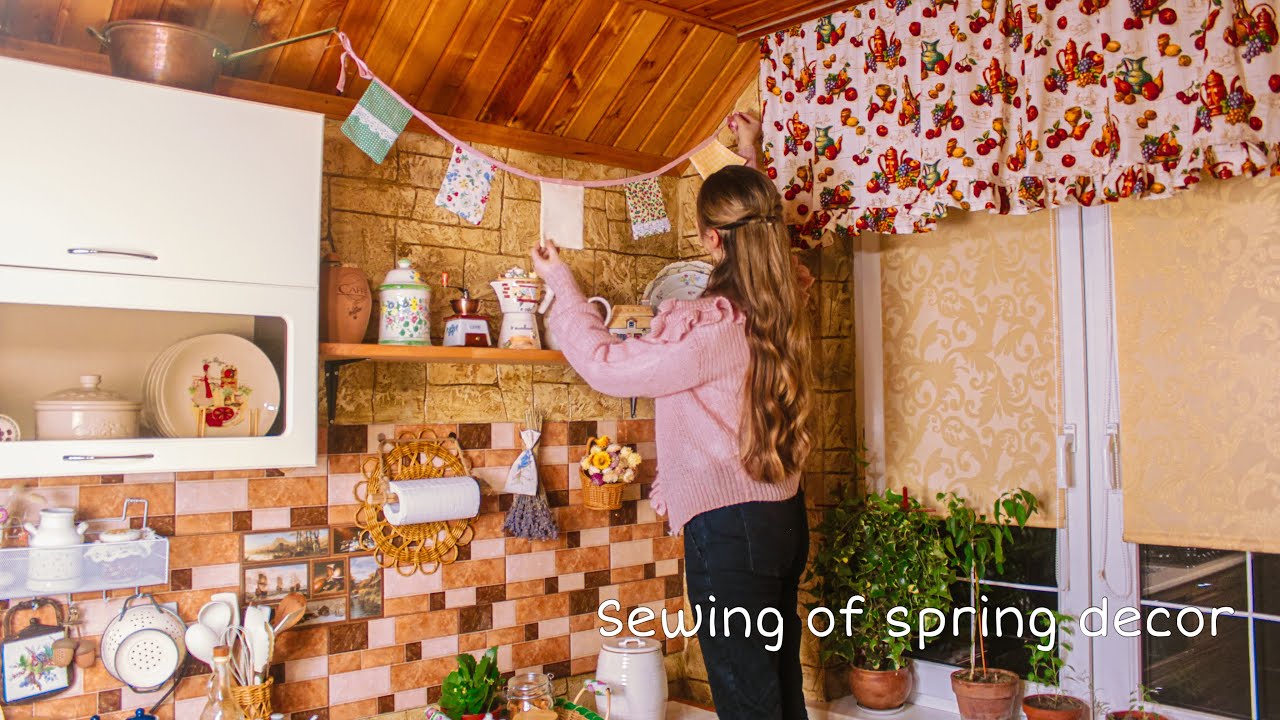 A cozy daily routine in a country home. Sewing spring decor for a ...