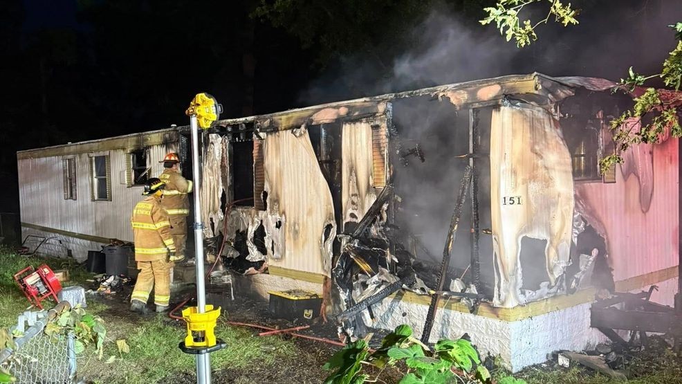 Fire crews extinguish heavily burning single-wide mobile home in Wayne ...