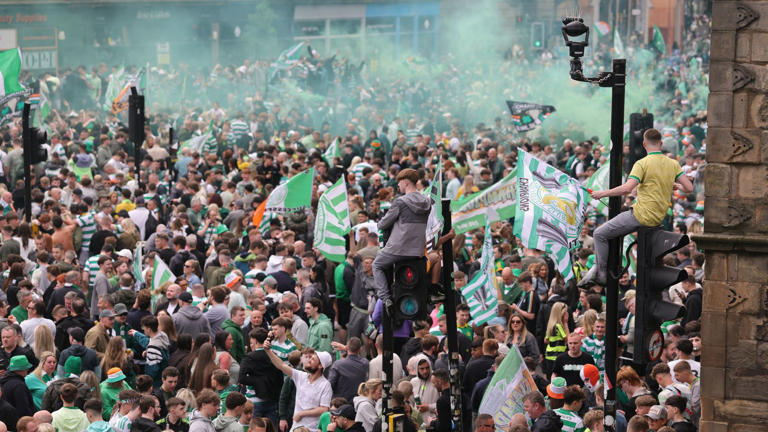 Police officers injured during serious disorder after Celtic's title win