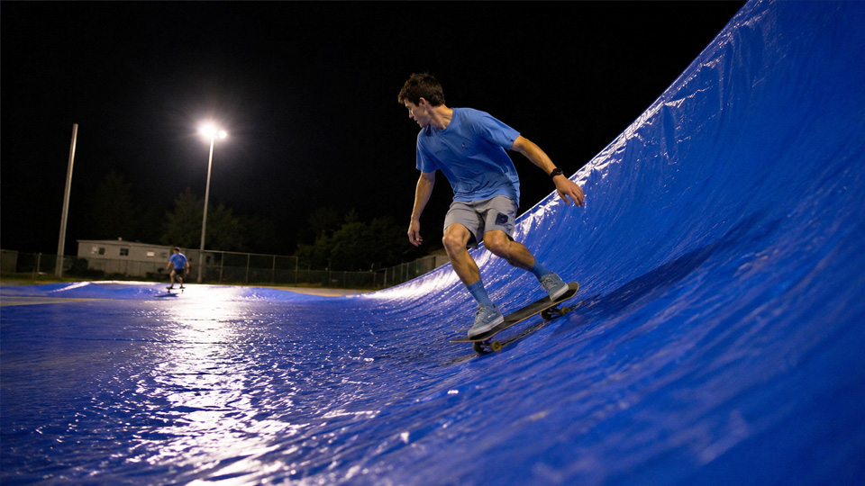 Tarp surfing turns backyard into massive wave ride