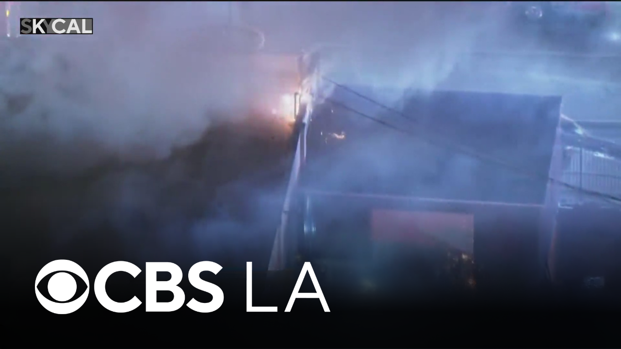 Los Angeles firefighters battle second alarm blaze at Van Nuys ...