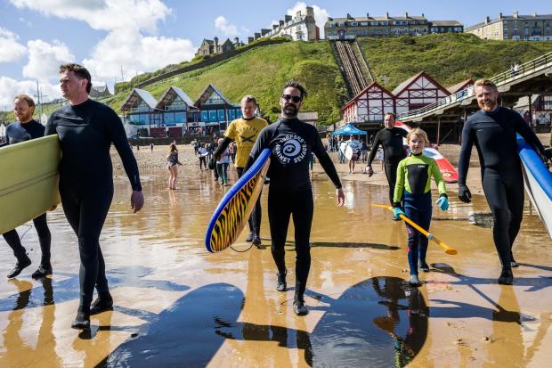 Surfers and swimmers protest against 'scandalous' sewage crisis on ...