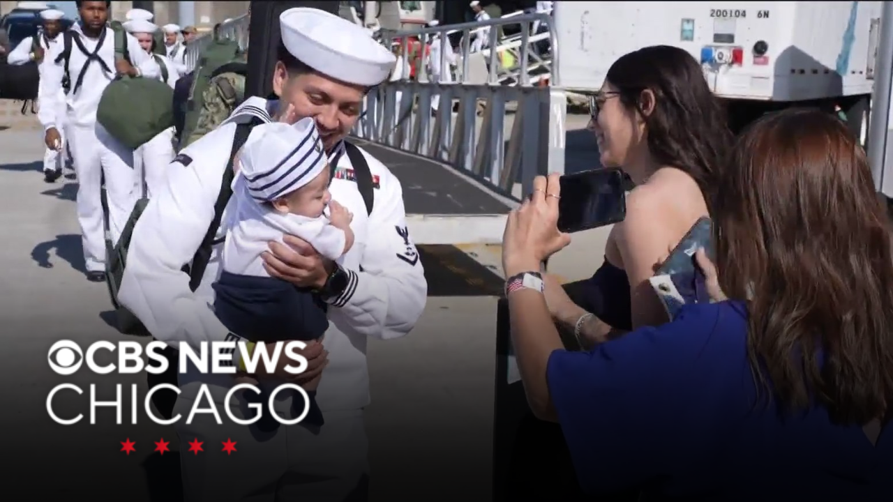 USS Ford sailor sees his baby for first time after returning home