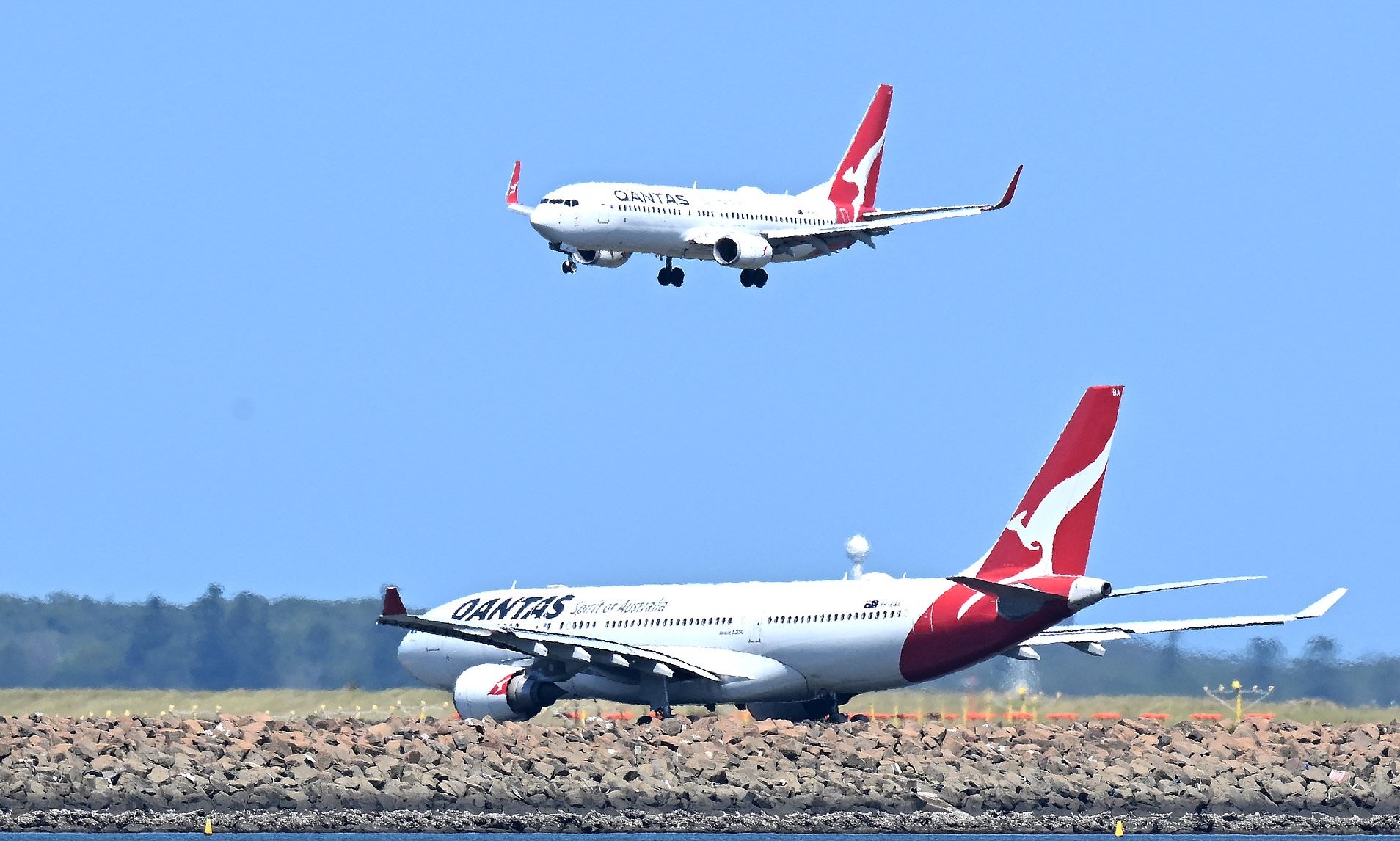 Qantas passenger is kicked off international flight after allegedly ...