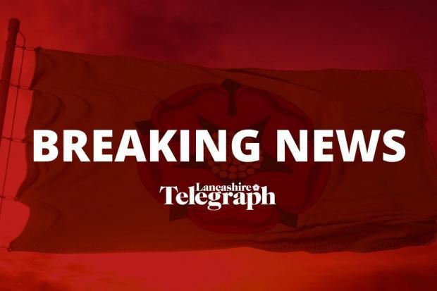 Woman, 31, arrested as emergency services descend and cordon off street