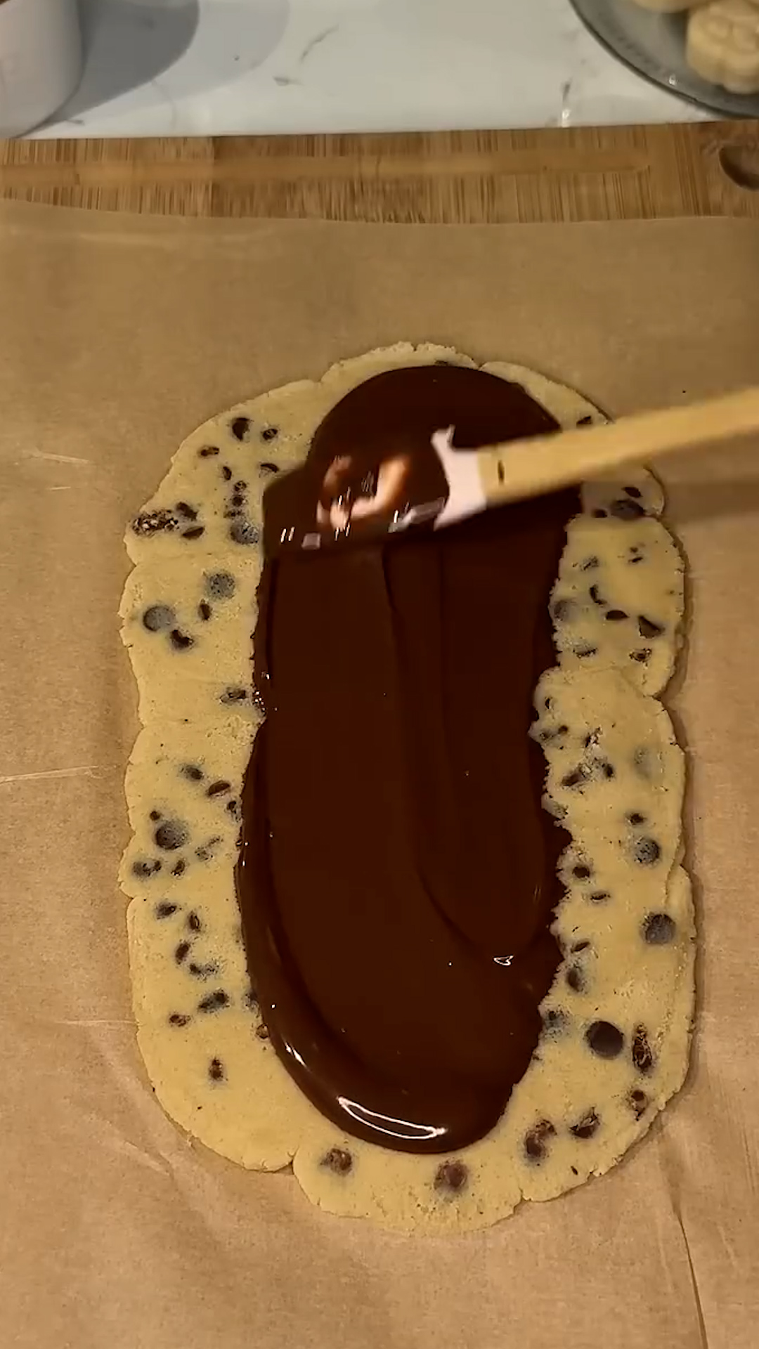Safe-to-eat dough frozen into snackable chocolate bark pieces