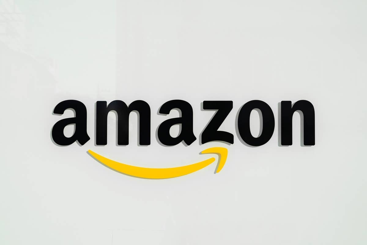 Amazon's ultra-modern floor-to-ceiling cat tree makes the most of your ...