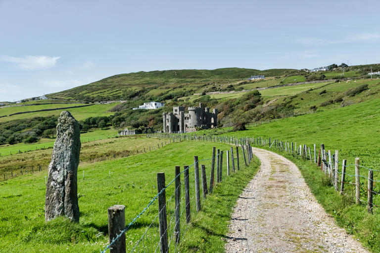 In Ireland, this neo-Gothic castle set beside a lake is one of the most ...