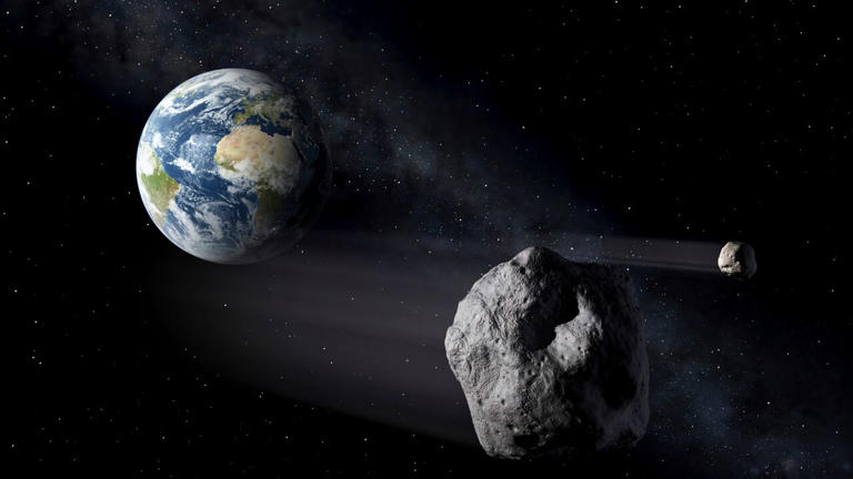 Grote asteroïde scheert 'rakelings' langs de aarde: "Zo dicht als je ...