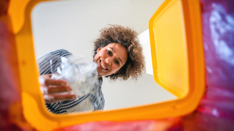 Don't throw away plastic container lids: Use two for adorable hanging decor