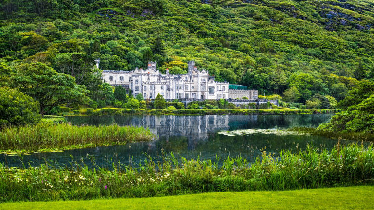 In Ireland, this neo-Gothic castle set beside a lake is one of the most ...