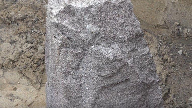 Bronze Age stone with face found in Alderney dig