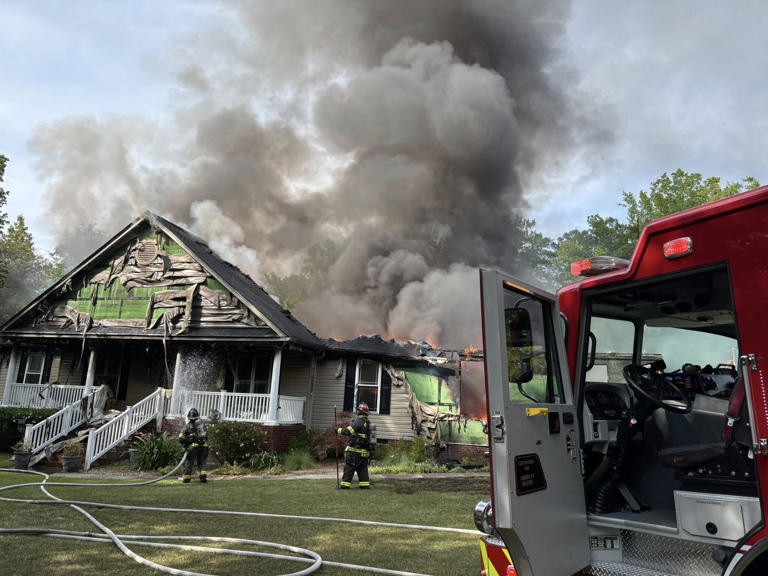 Several departments put out large home fire in Elgin, officials say
