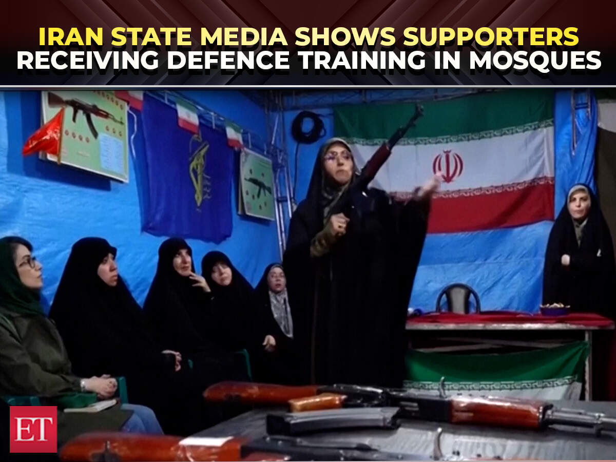 Iranian state media shows government supporters receiving defence ...