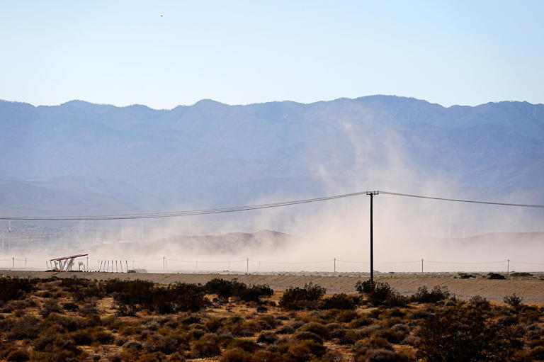 Blowing sand causes major road closures in Palm Springs