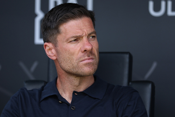 Gary Neville makes Arne Slot prediction after Chelsea appoint Xabi Alonso