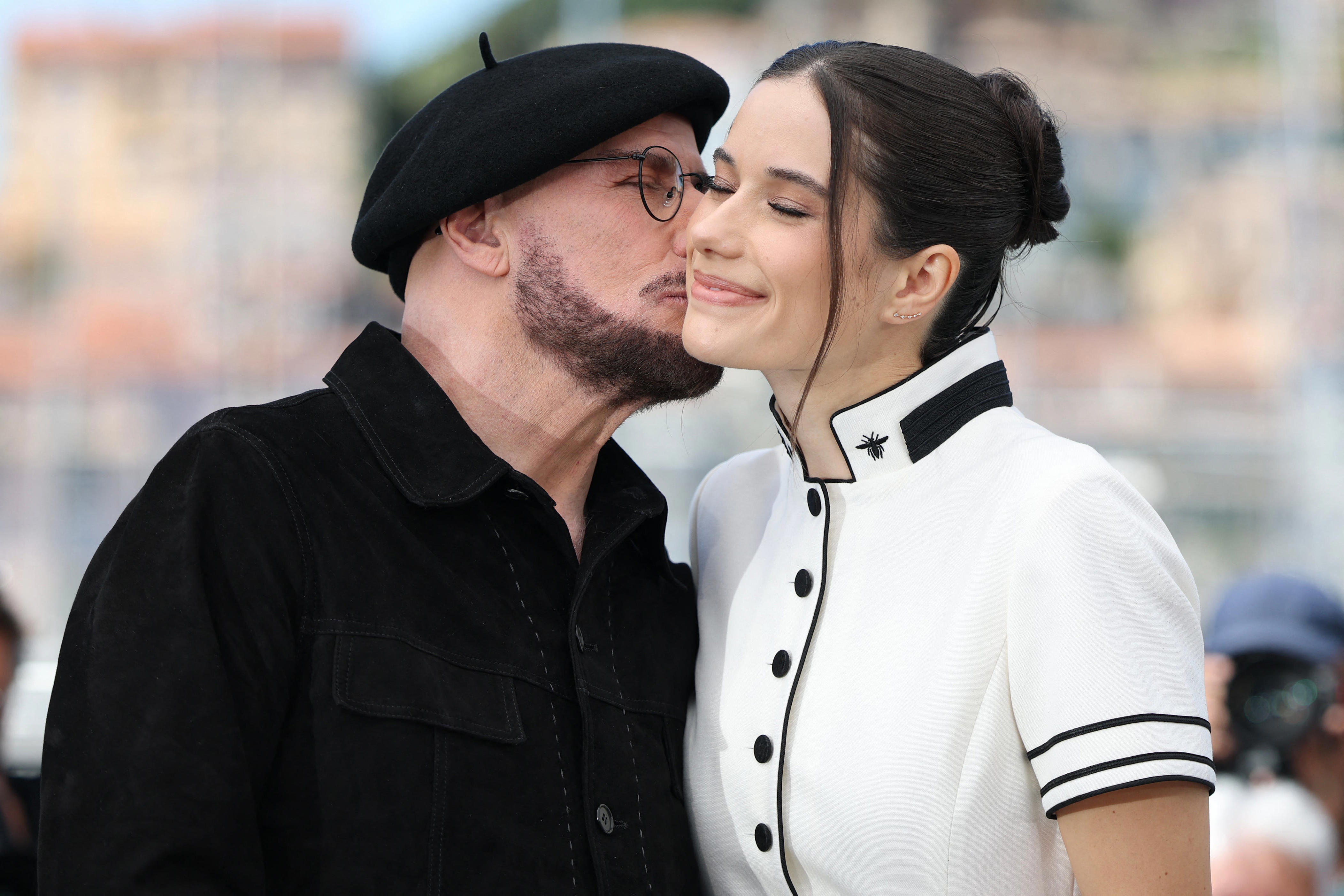 John Travolta debuts viral new beret look alongside daughter Ella
