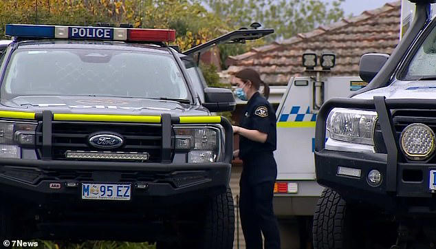 Woman's body lay rotting in hallway for weeks inside home she shared ...
