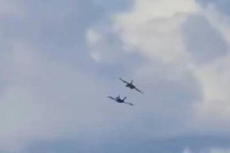 Two $70m Navy jets crash during air show as crew members eject mid-air