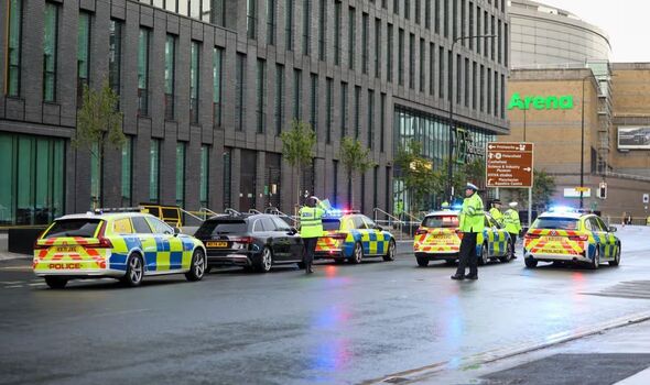 Manchester city centre incident: Police swarm streets and tell people ...