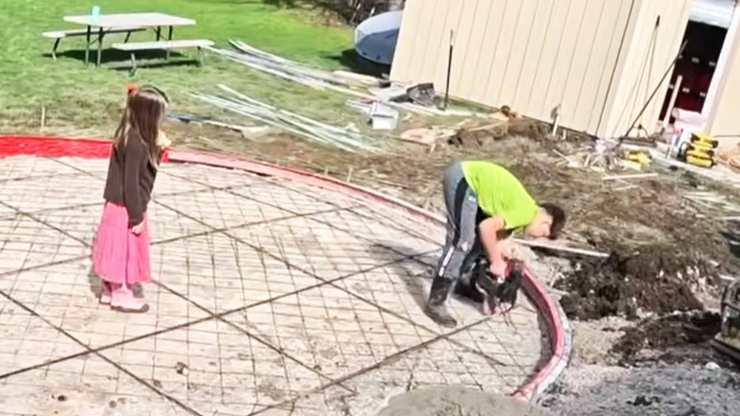 Victory Outdoor Services builds a patio together
