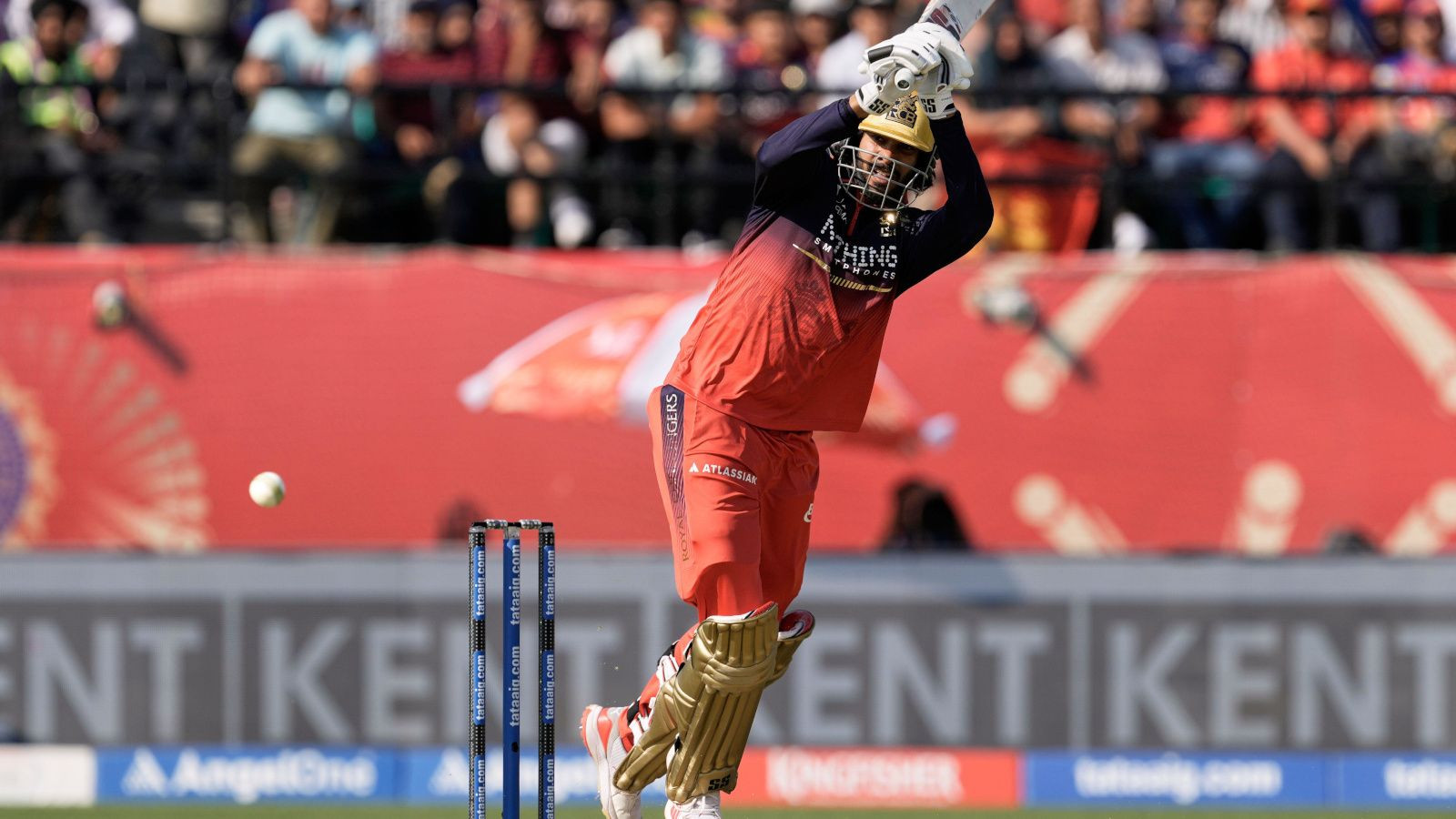 RCB books IPL playoff spot while DC hold their nerve against RR