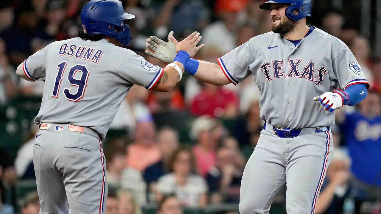 Jake Burger and Nathan Eovaldi propel Rangers to 8-0 victory over Astros