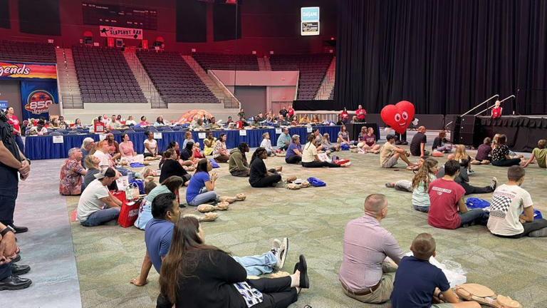 Hundreds learn CPR at Pensacola Bay Center in Gulf Coast Press the ...