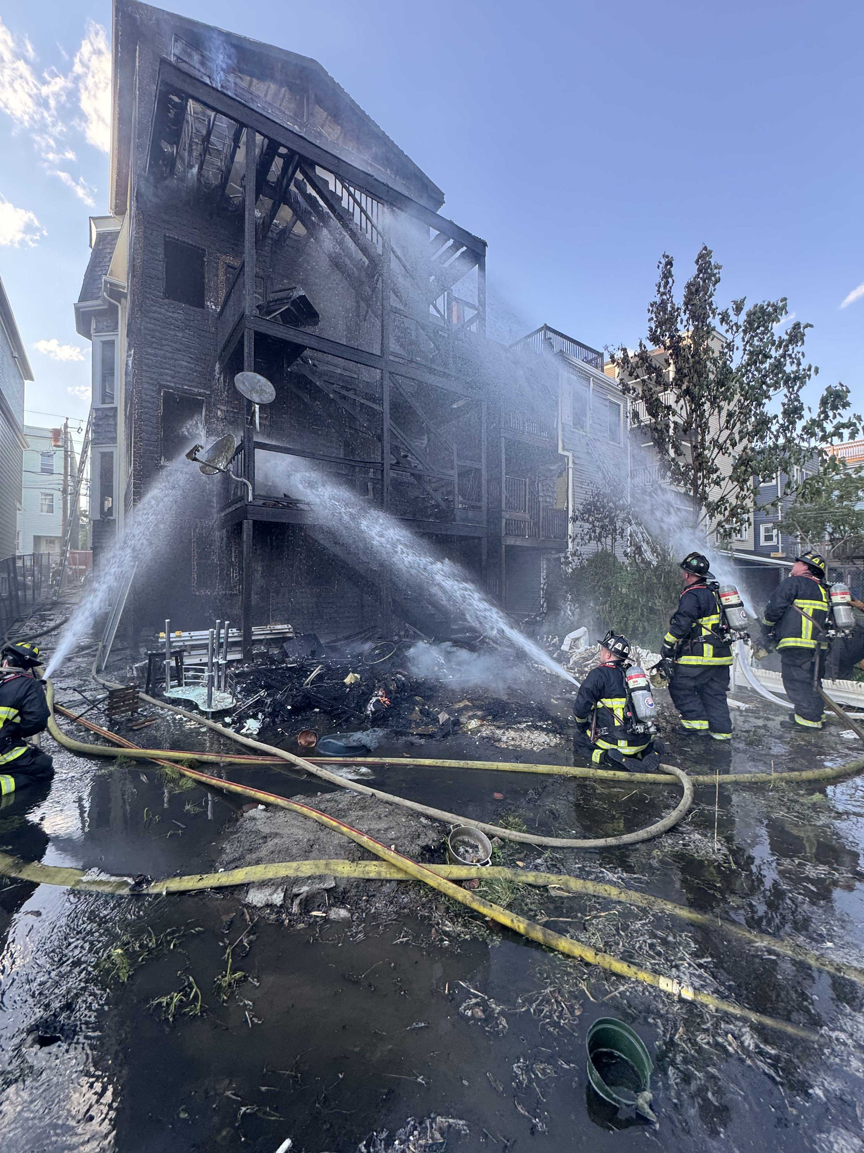 Firefighter hurt when flames spread through several East Boston buildings