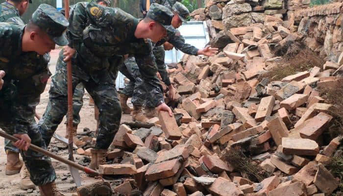 China earthquake: 13 buildings collapse, two dead after 5.2-magnitude ...