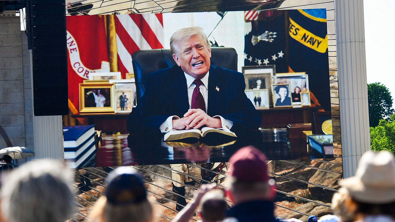 Trump reads Bible as thousands pack National Mall for America 250 ...
