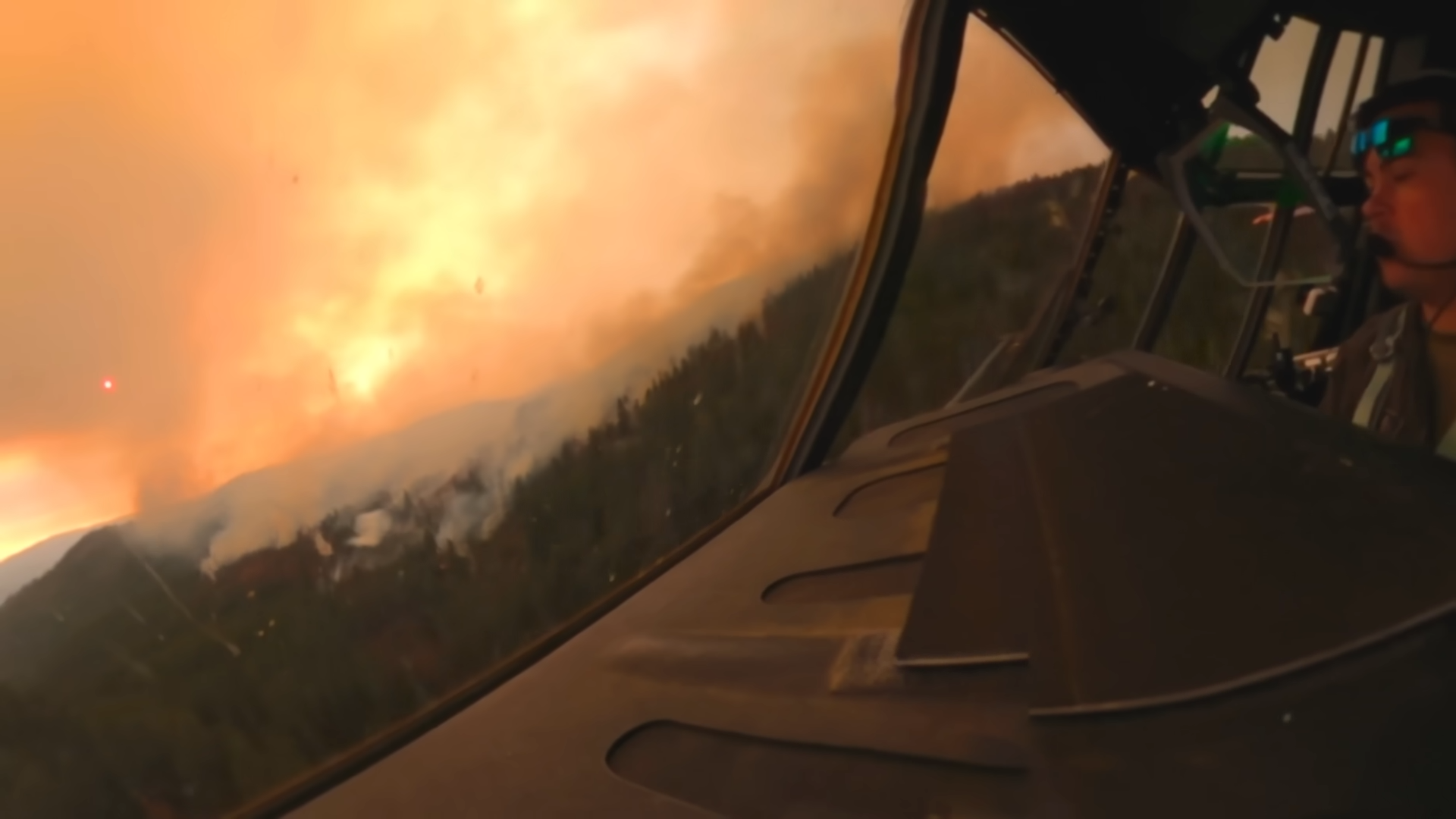 Watch a 70 ton C-130 dive straight into a massive firestorm - "Pure ...