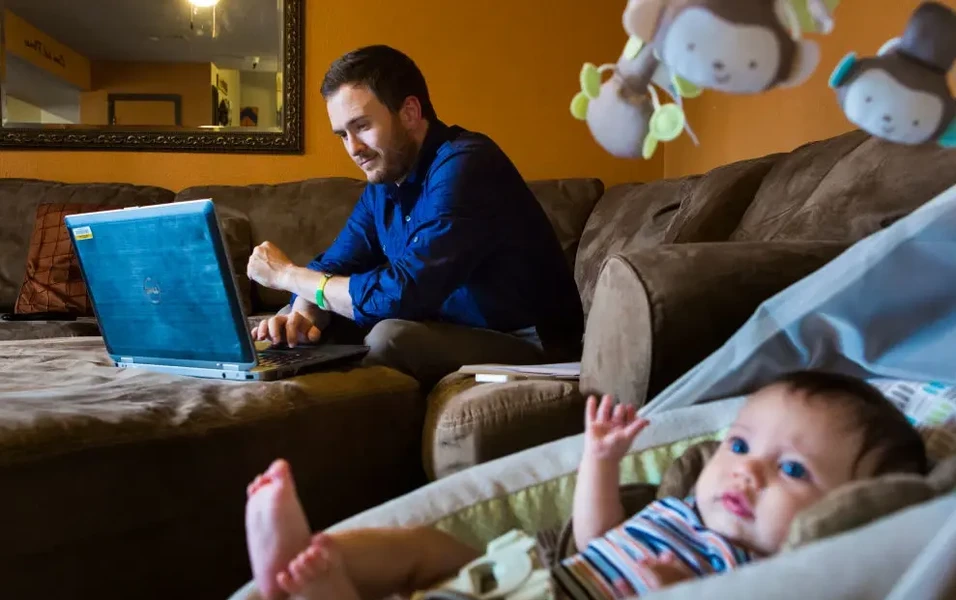 College-educated fathers cut work hours, boost caregiving time