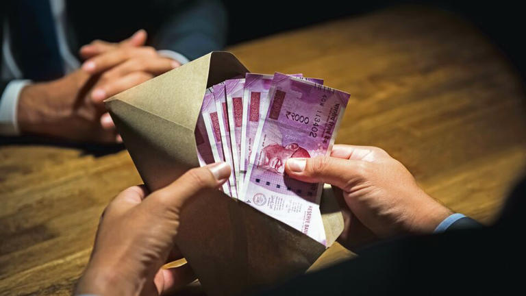 Rupee falls 20 paise to open at a record low of 96.17 against the US dollar