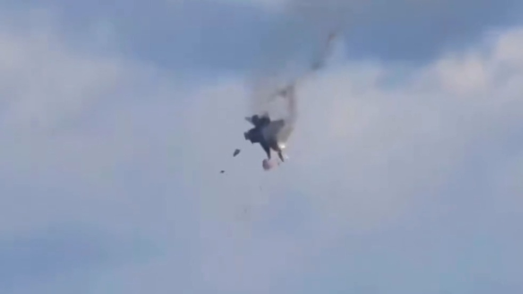 Fighter jets collide mid-air at air show, pilots eject