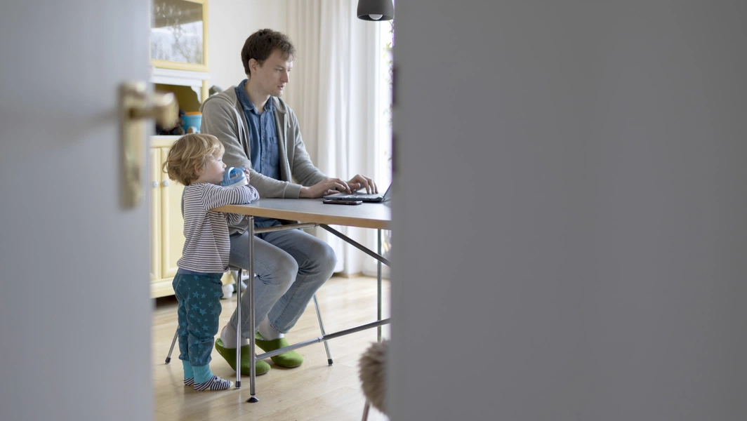 College-educated fathers cut work hours, boost caregiving time