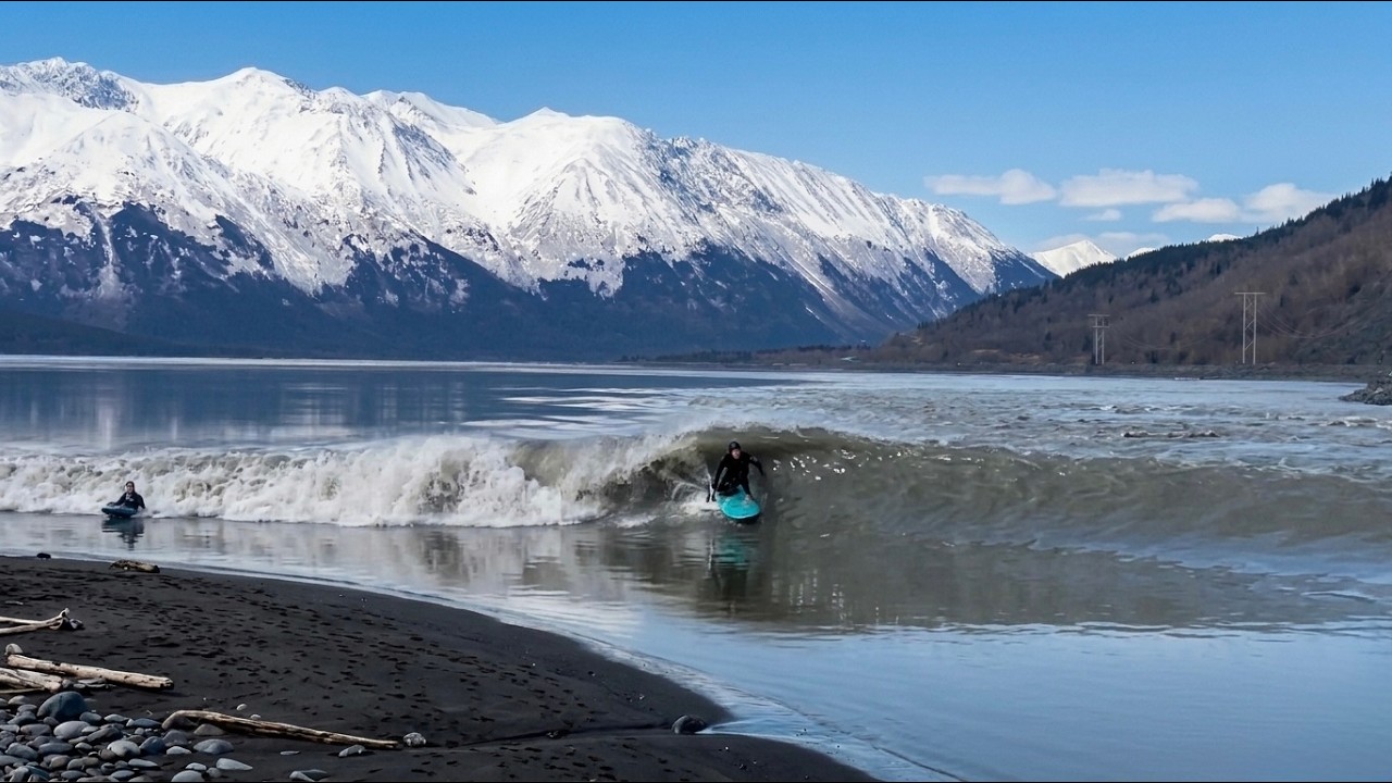 Attempting to surf a tidal wave in Alaska