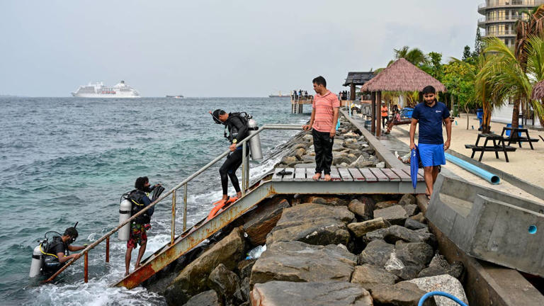 Maldives scuba diving deaths: Terrifying new theory emerges about cause ...