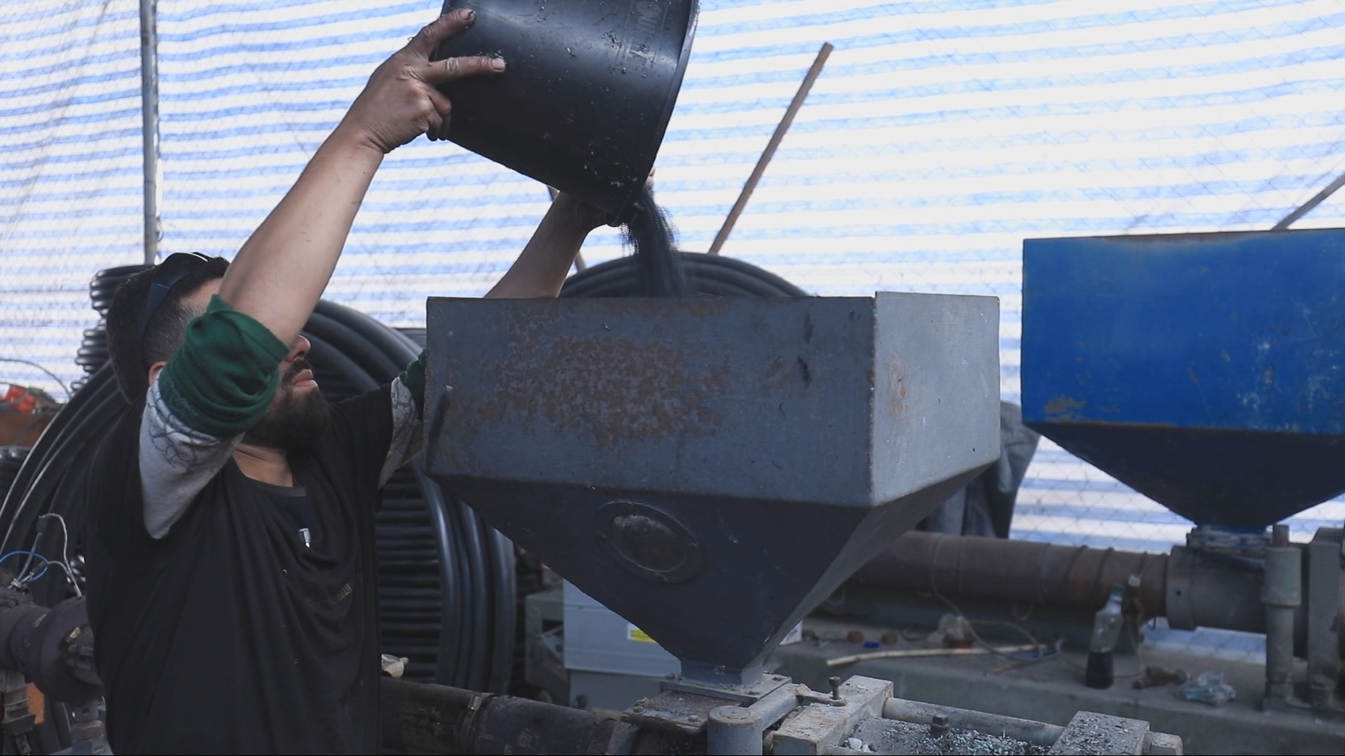 Gaza recycles plastic waste into water hoses amid supply shortages