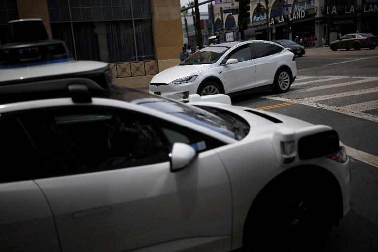 Tesla's Musk expects widespread use in US of cars without human ...