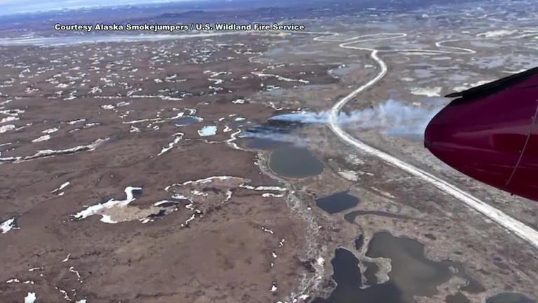 Firefighters work to put out two fires in Alaska
