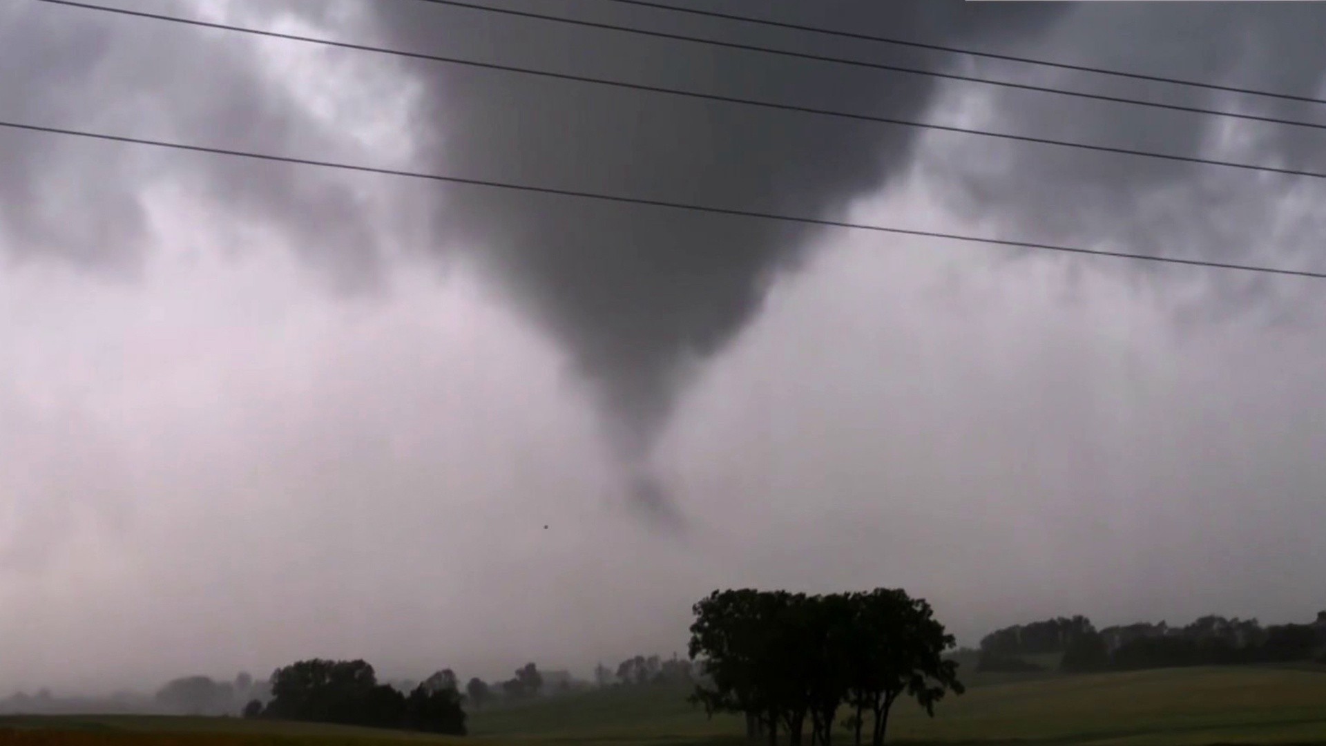 Tornadoes slam Midwest as hot temperatures bake East Coast
